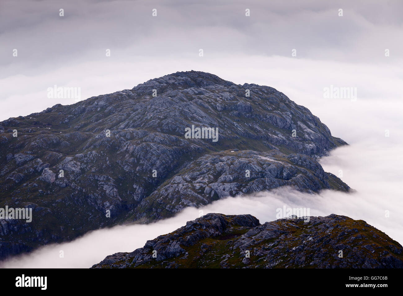 Inversion funneled through a narrow depression in between two hills ...