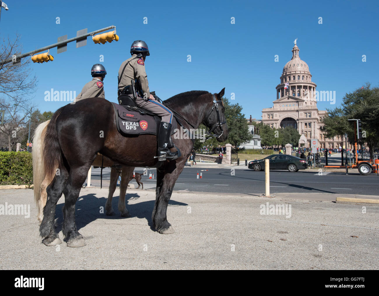 Texas Dept. of Public Safety officers patrol on horseback at a Martin ...