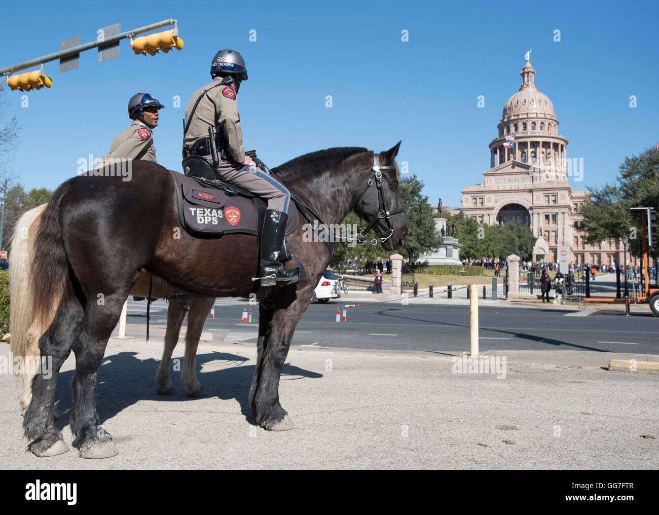 Texas Dept. of Public Safety officers patrol on horseback at a Martin ...