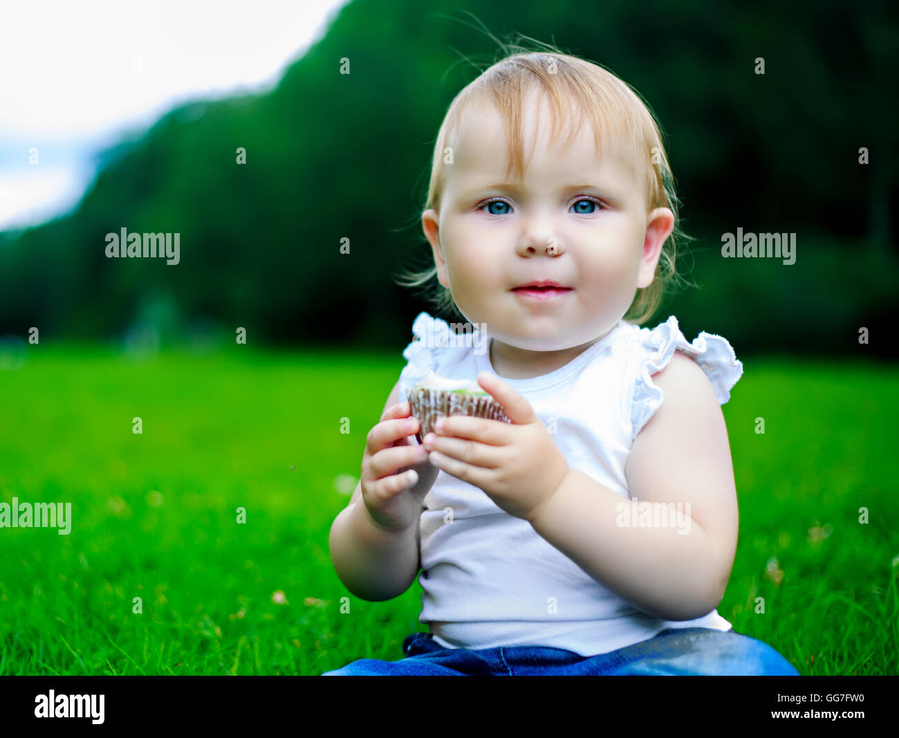 Baby eating cake outdoor hi-res stock photography and images - Alamy