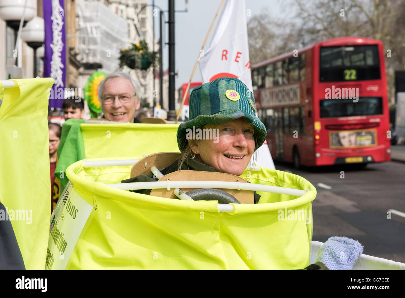 Protesters wearing yellow costumes marked as "Radioactive Waste" at 5th ...