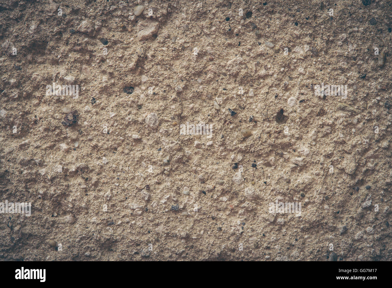 rough plastered wall with little stones as a background Stock Photo - Alamy