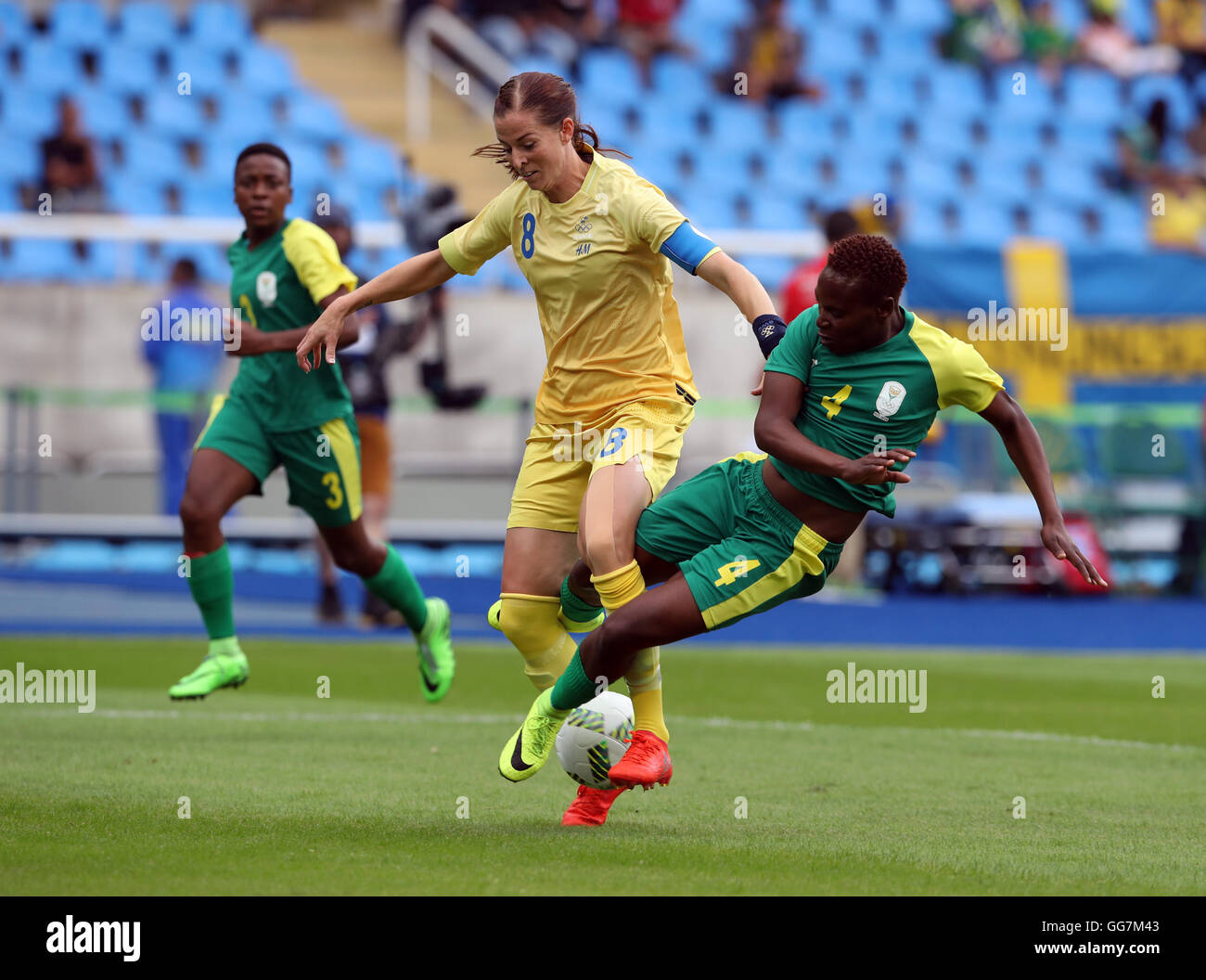 South Africas Noko Matlou And Swedens Lotta Schelin In Action During