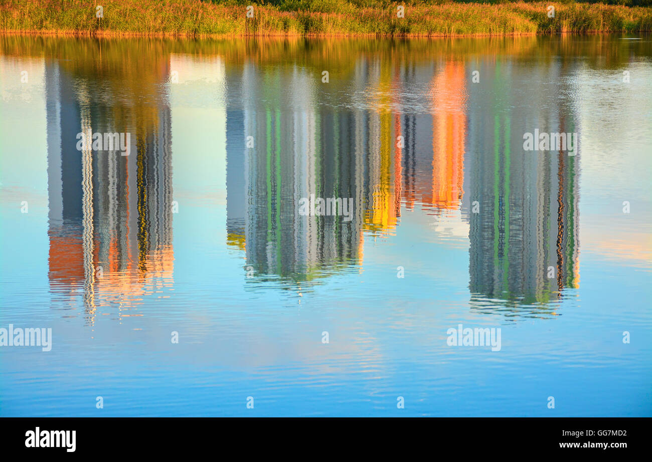 Reflection of houses in water pond Stock Photo - Alamy