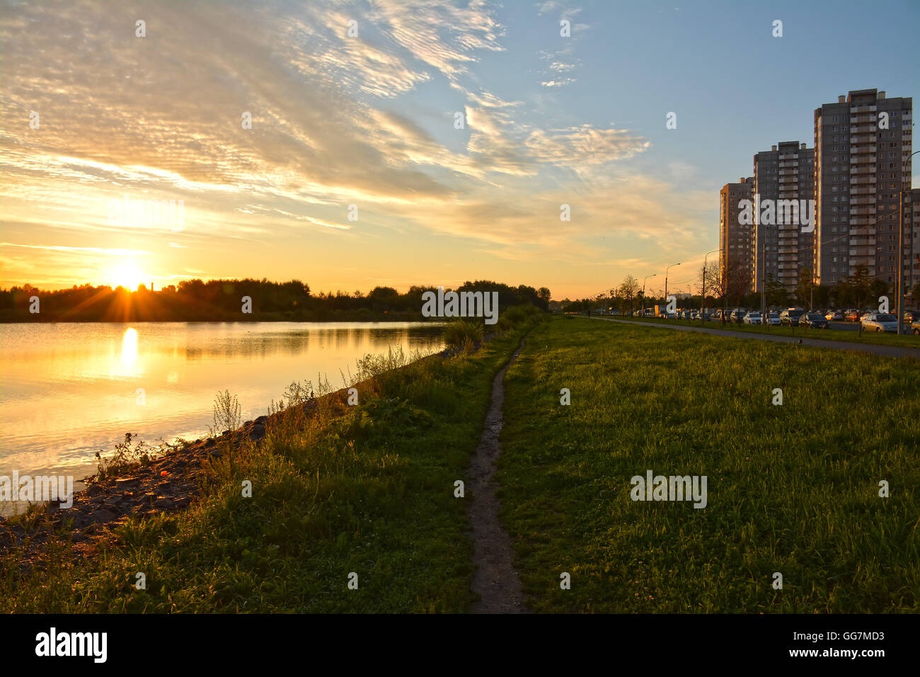The first rays of the sun in the sky Stock Photo - Alamy