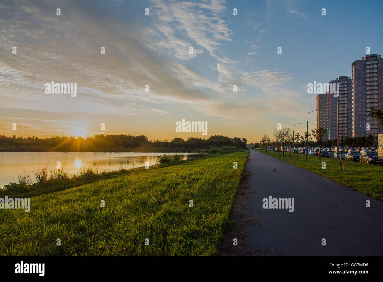 The first rays of the sun in the sky Stock Photo - Alamy