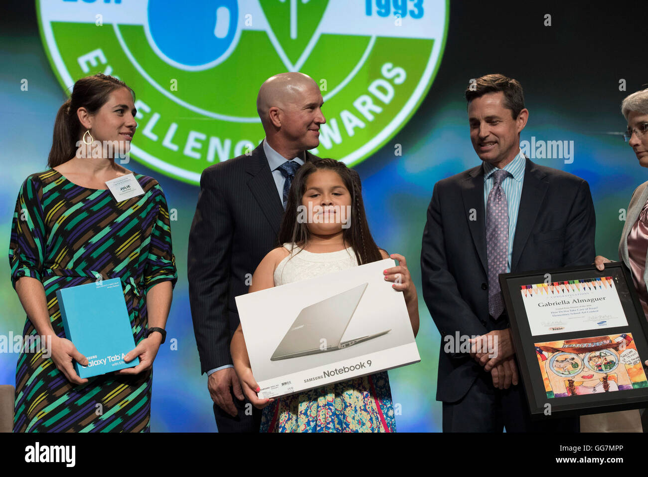 Texas Environmental Excellence Award winners pose on stage with members ...