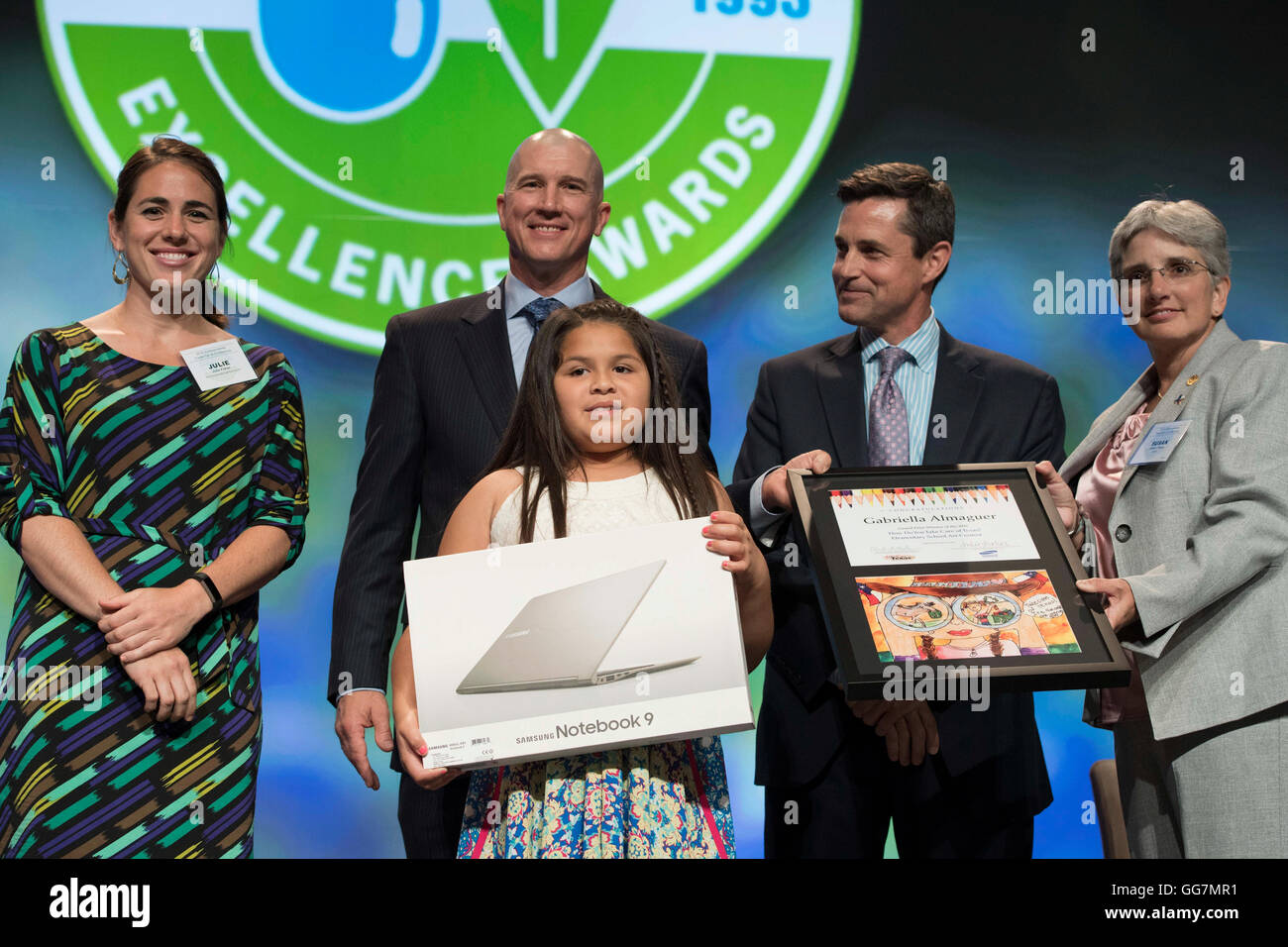 Texas Environmental Excellence Award winners pose on stage with members ...