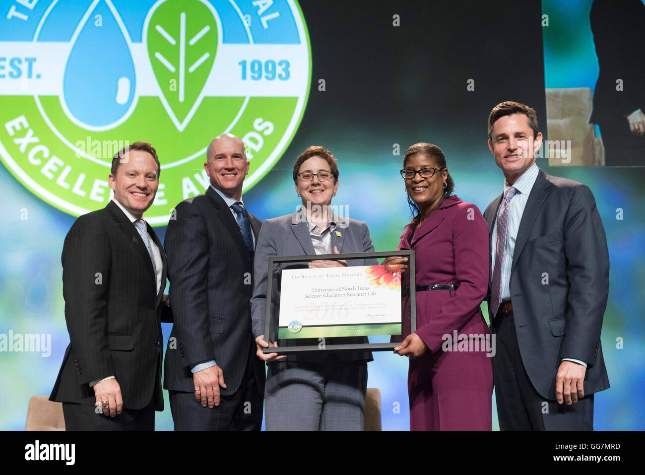 Texas Environmental Excellence Award winners pose on stage with members ...