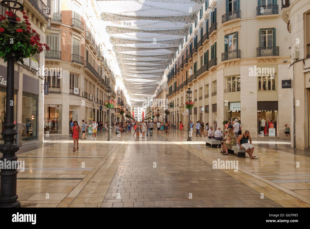 Calle Marqués de Larios Malaga pedestrian main street, covered with sun ...