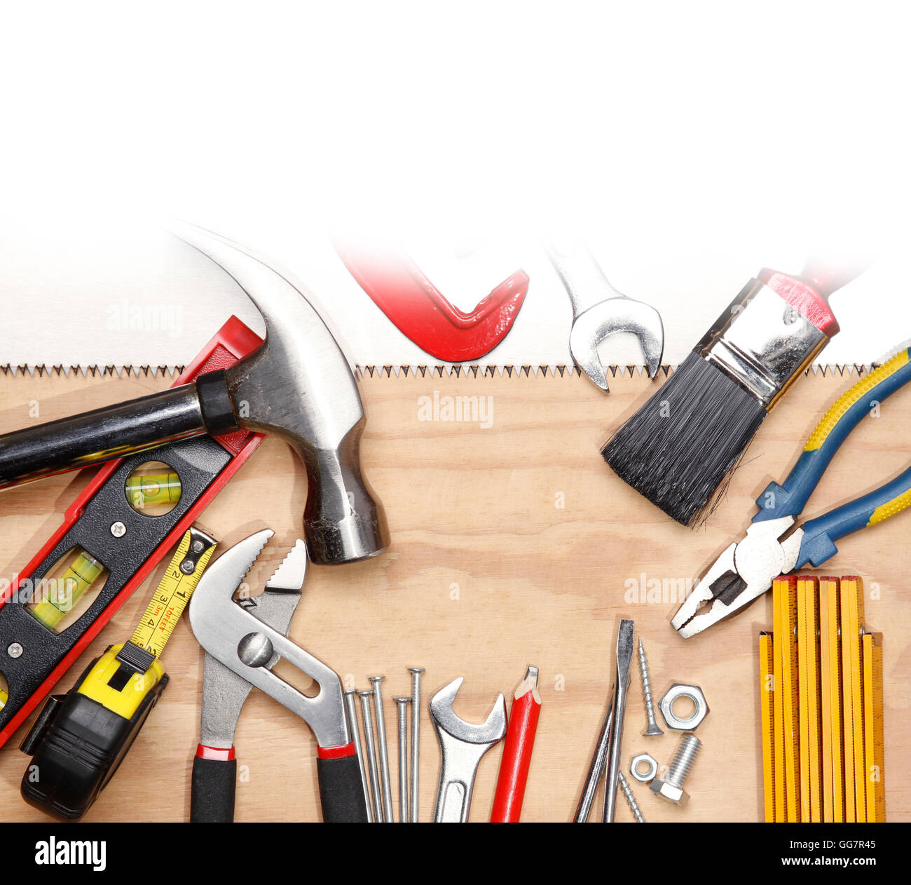 Assorted work tools on wood, copy space above Stock Photo - Alamy