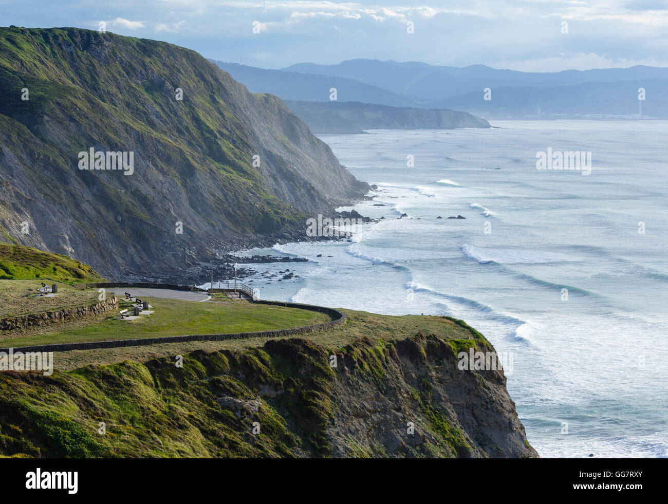 Summer evening ocean coastline view near beach in Barrika town, Biscay ...