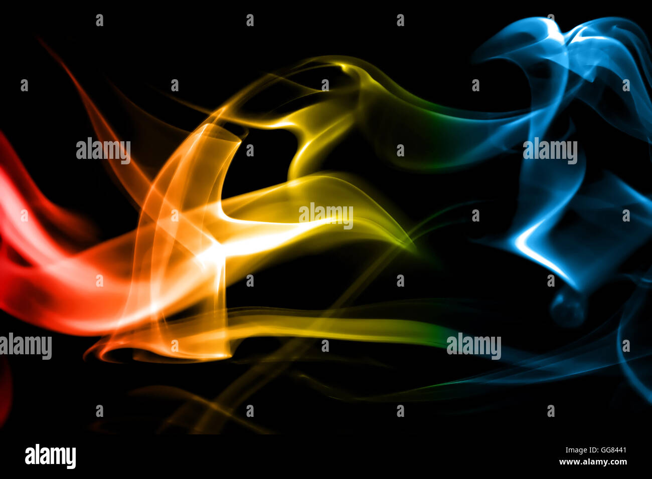 Fight colorful smoke on black background Stock Photo - Alamy