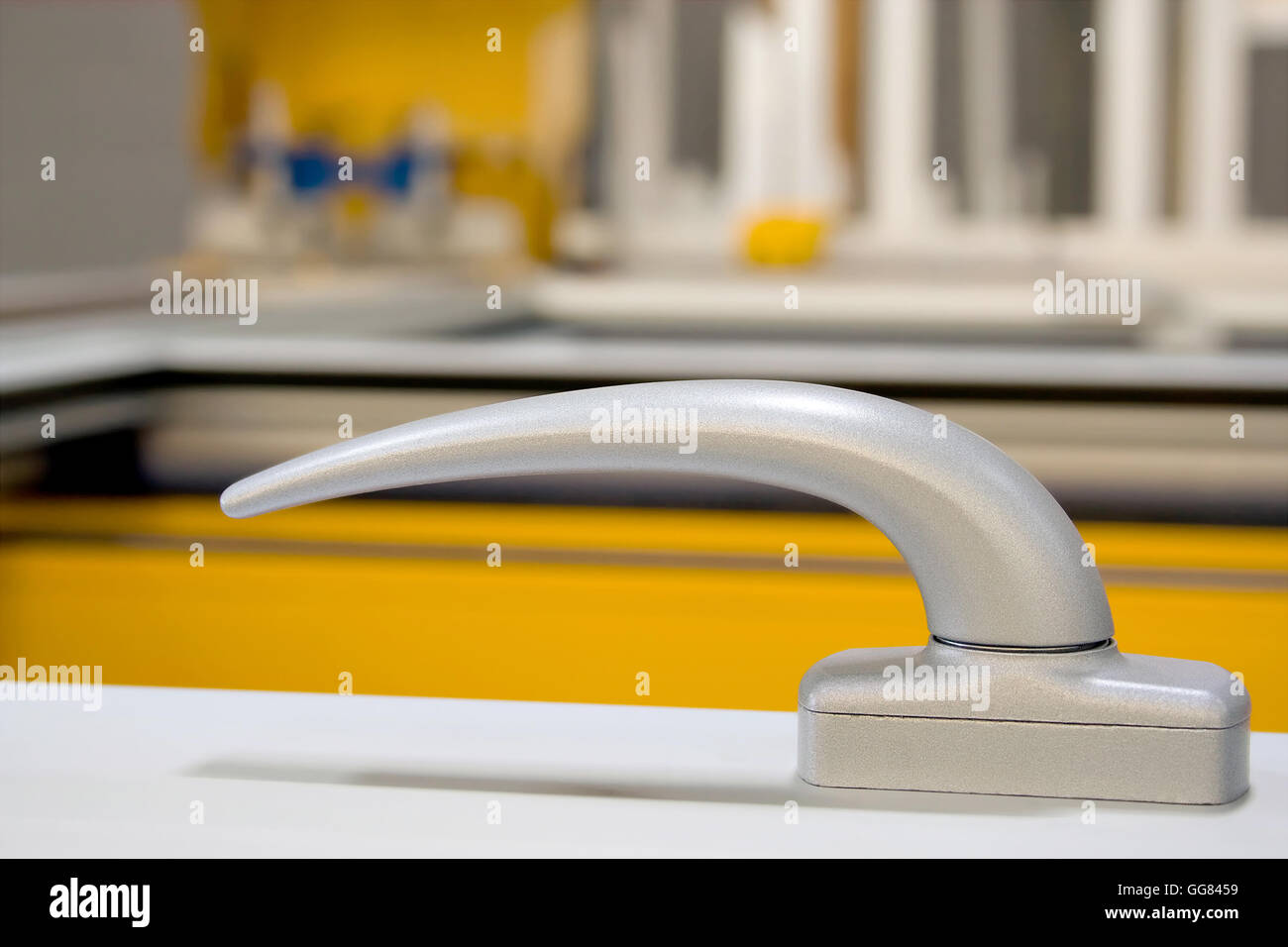 Gray handle of a door in the workshop. Horizontal image Stock Photo - Alamy