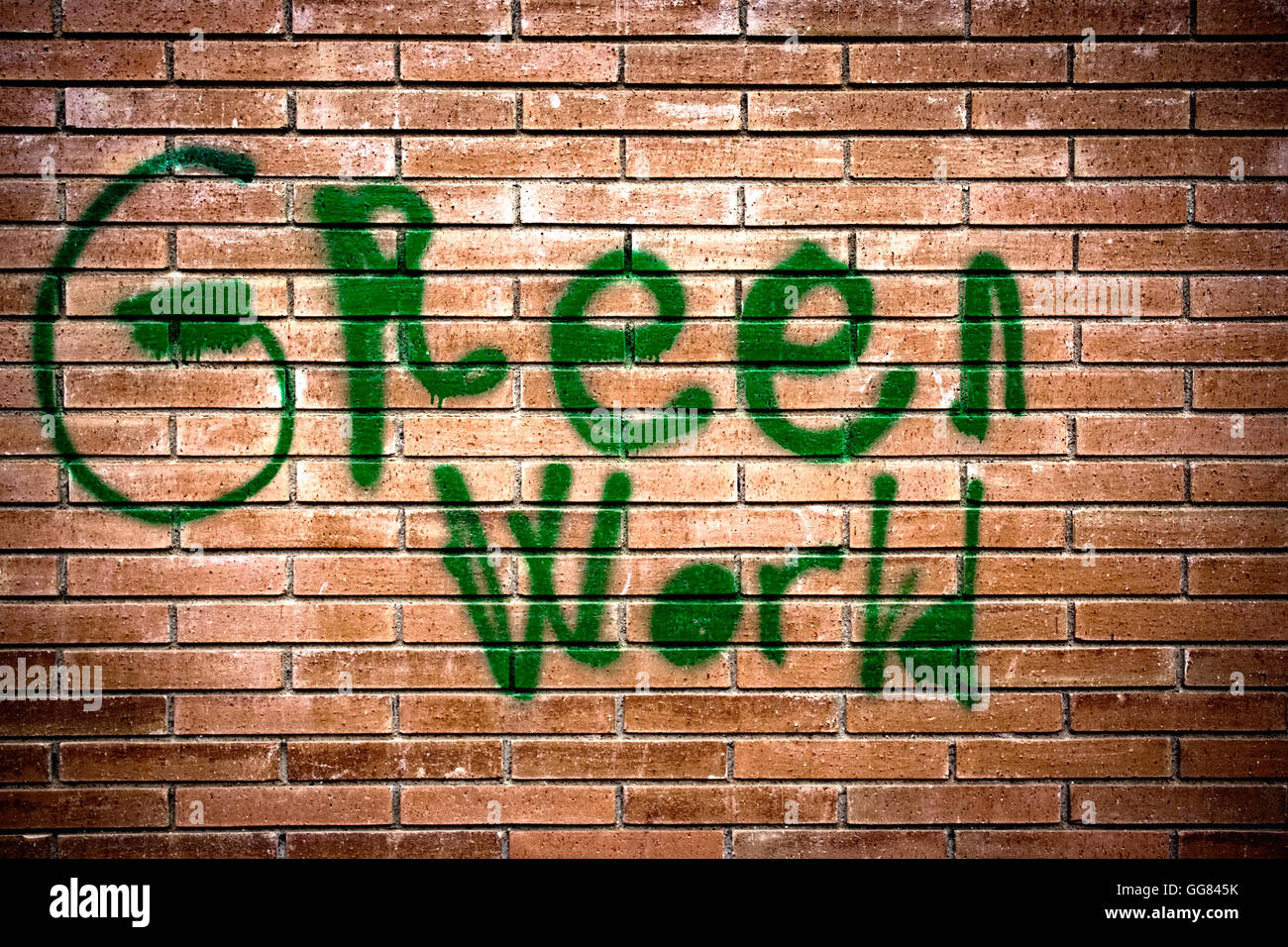 Green world writing on the wall with spray Stock Photo - Alamy