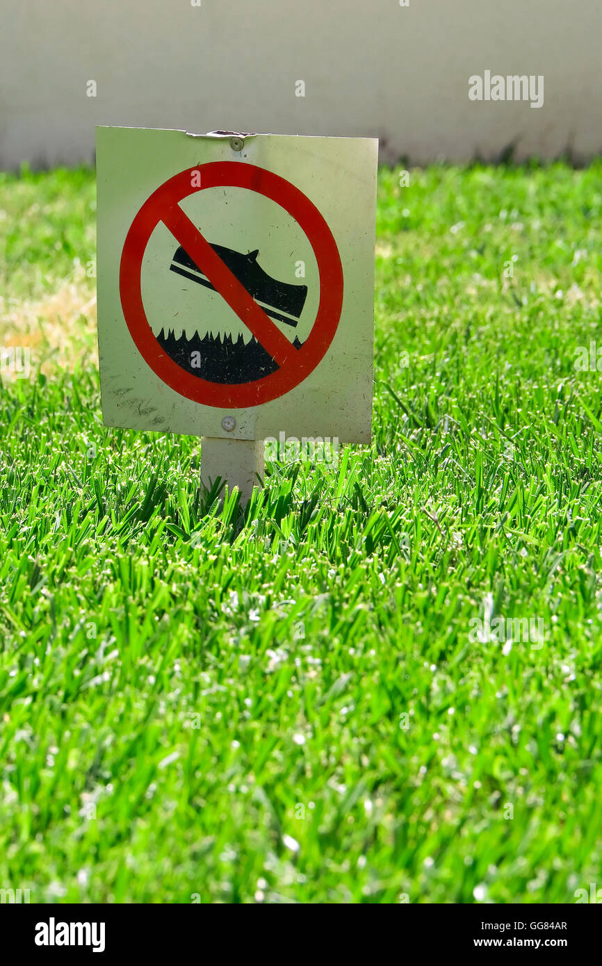 Prohibition sign on grass Stock Photo - Alamy