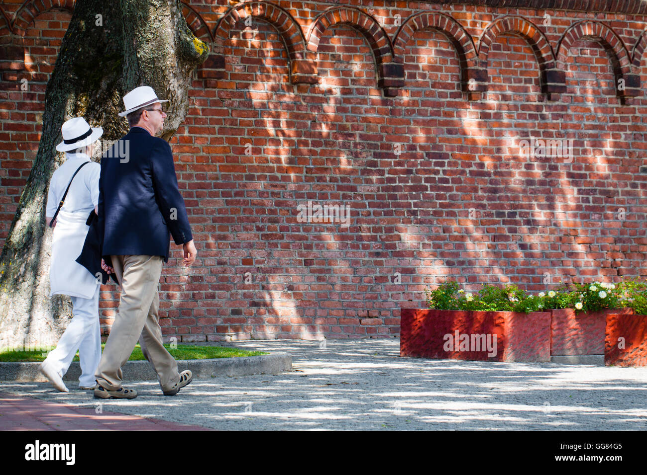 Elegant couple walking outside hi-res stock photography and images - Alamy