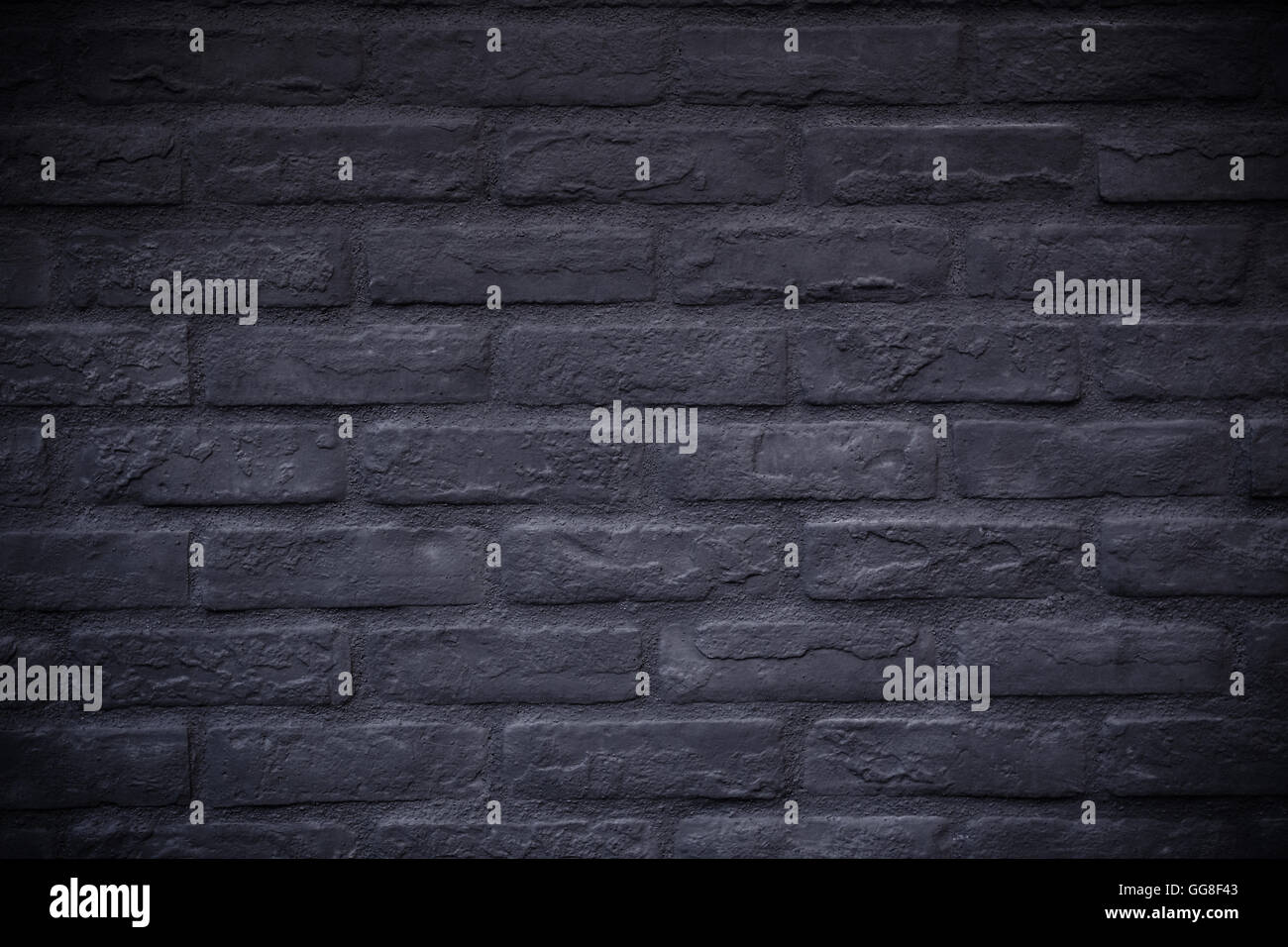 black rectangle brick mosaic in rectangle form with many irregularities ...