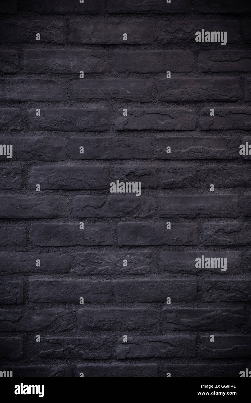 black rectangle brick mosaic in rectangle form with many irregularities ...