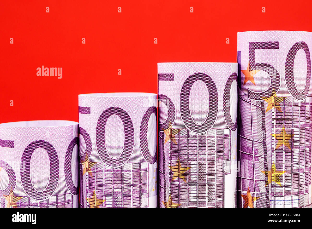 rising steps made of 500 euro banknotes on red background Stock Photo ...