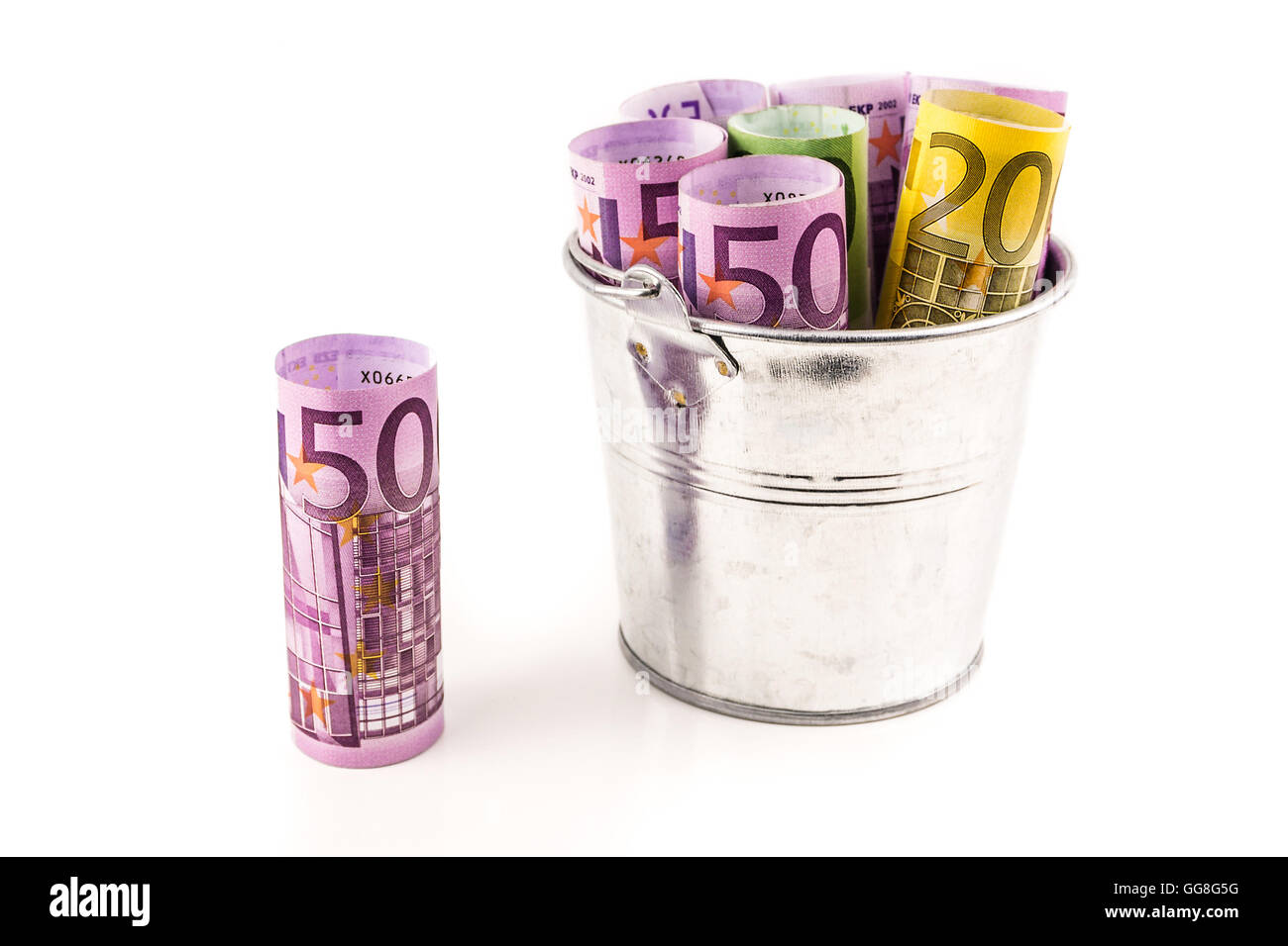 silver basket full of big euro banknotes on white background Stock ...