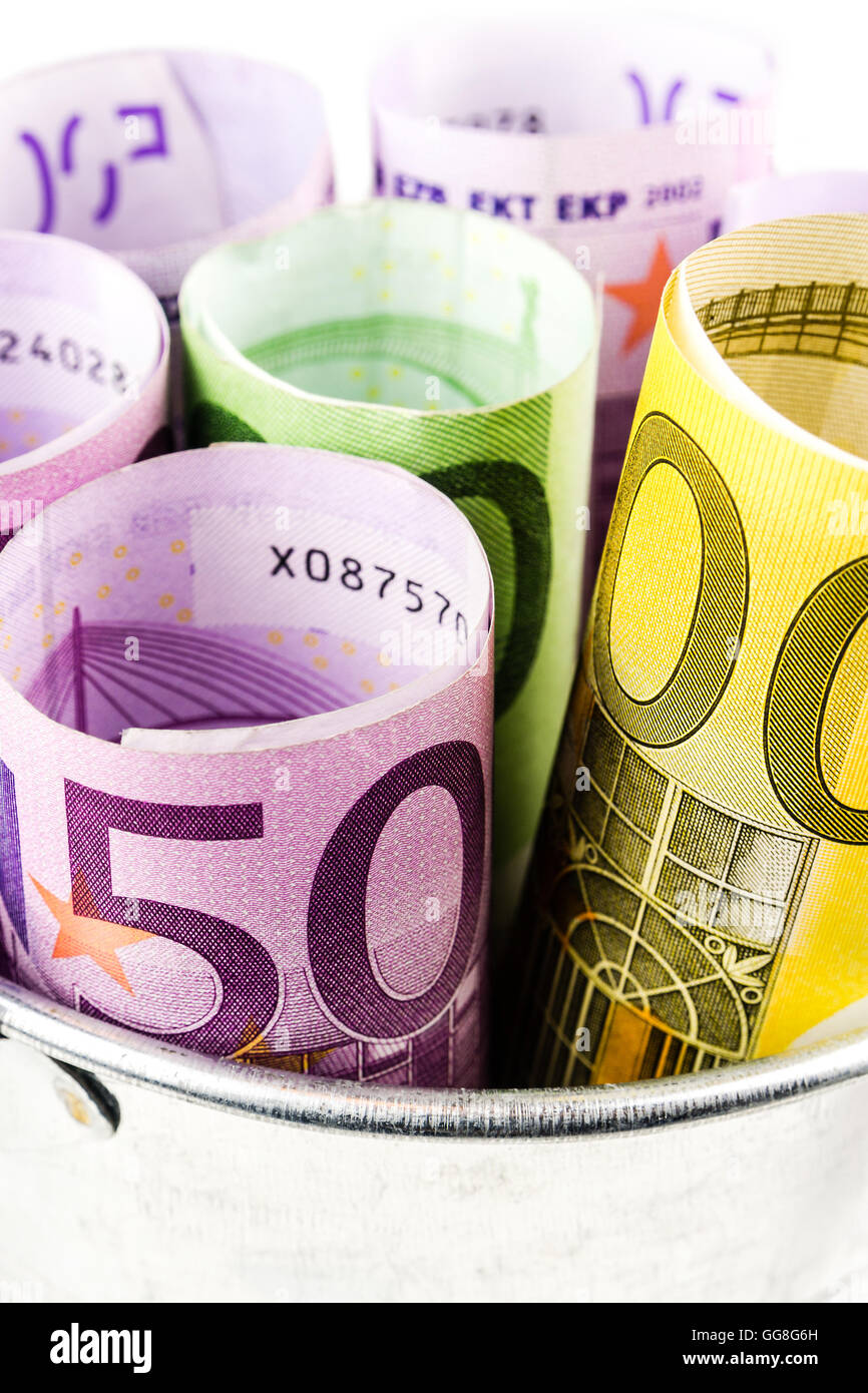 silver basket full of big euro banknotes on white background Stock ...