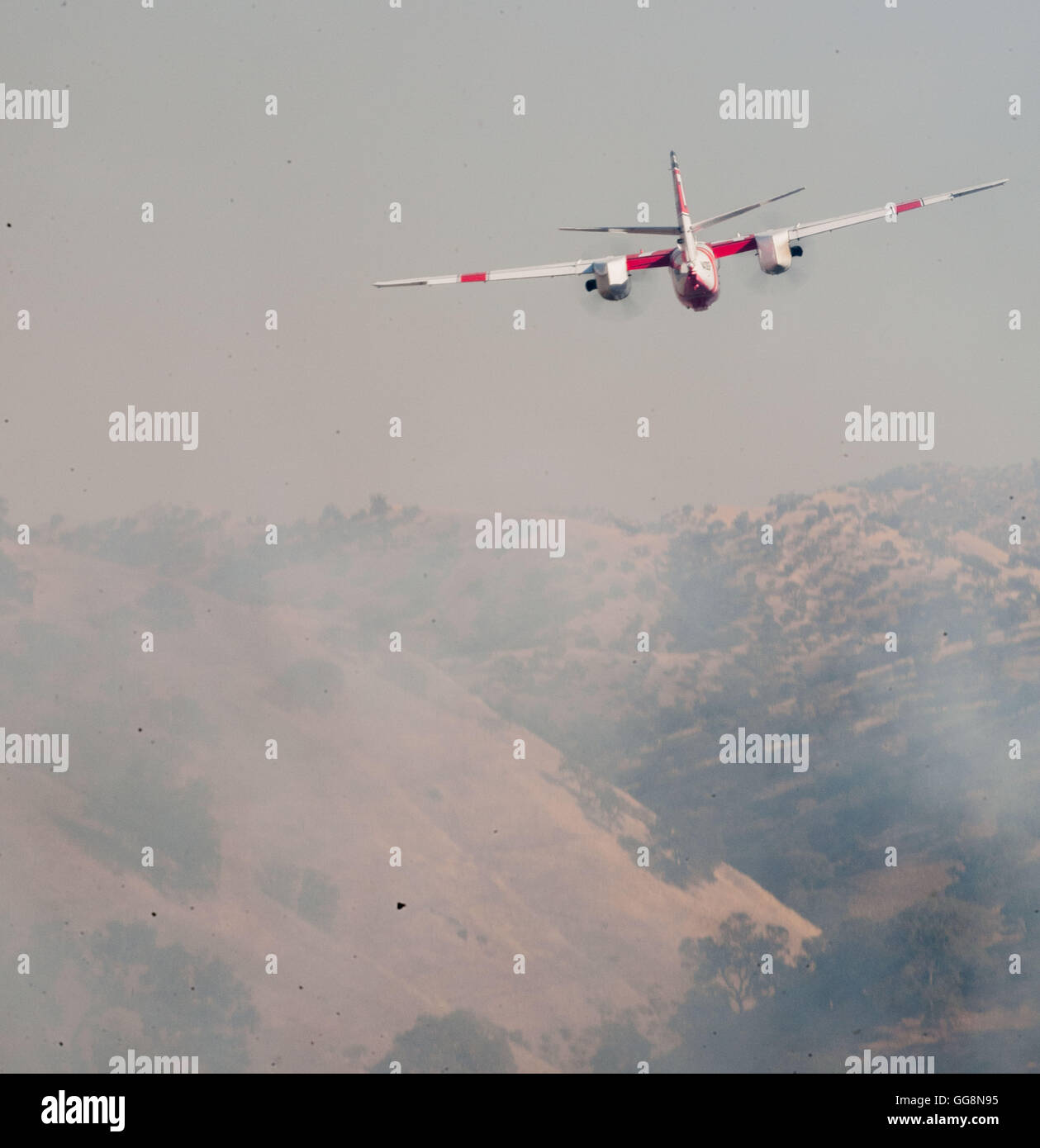 Diablo Grande, CA, USA. 3rd Aug, 2016. CalFire tanker 74 looks for his ...