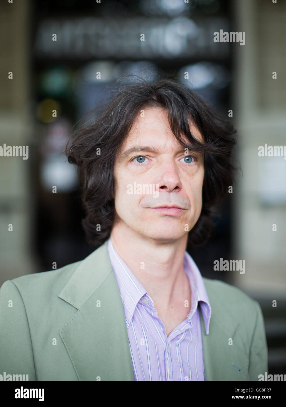 Neuss, Germany. 04th Aug, 2016. Music teacher Phillip Parusel stands in ...