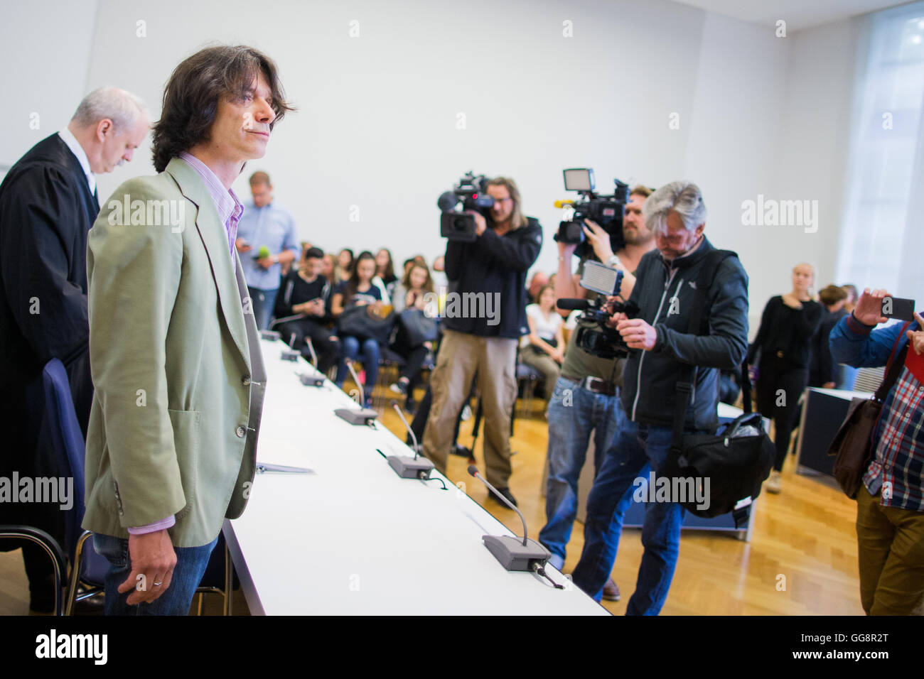 Neuss, Germany. 04th Aug, 2016. Music teacher Phillip Parusel stands in ...
