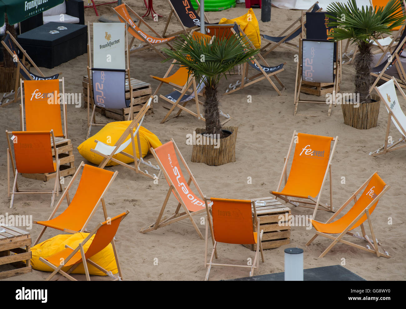Empty deck chairs can be seen at a beach bar on the German-Polish ...