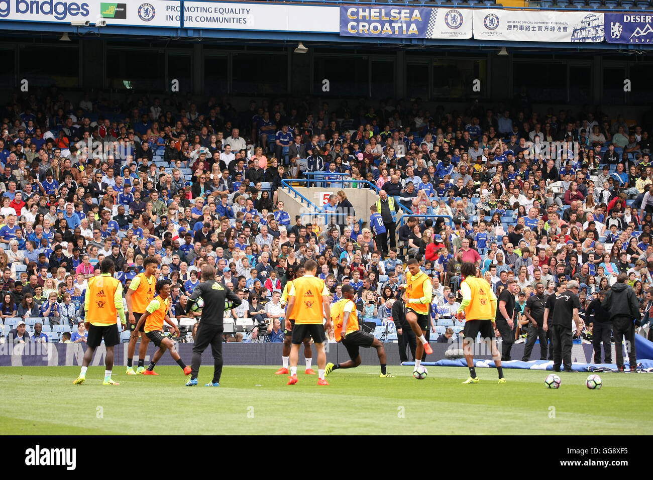 Chelsea Football team train at Stamford Bridge under the watchful eye ...