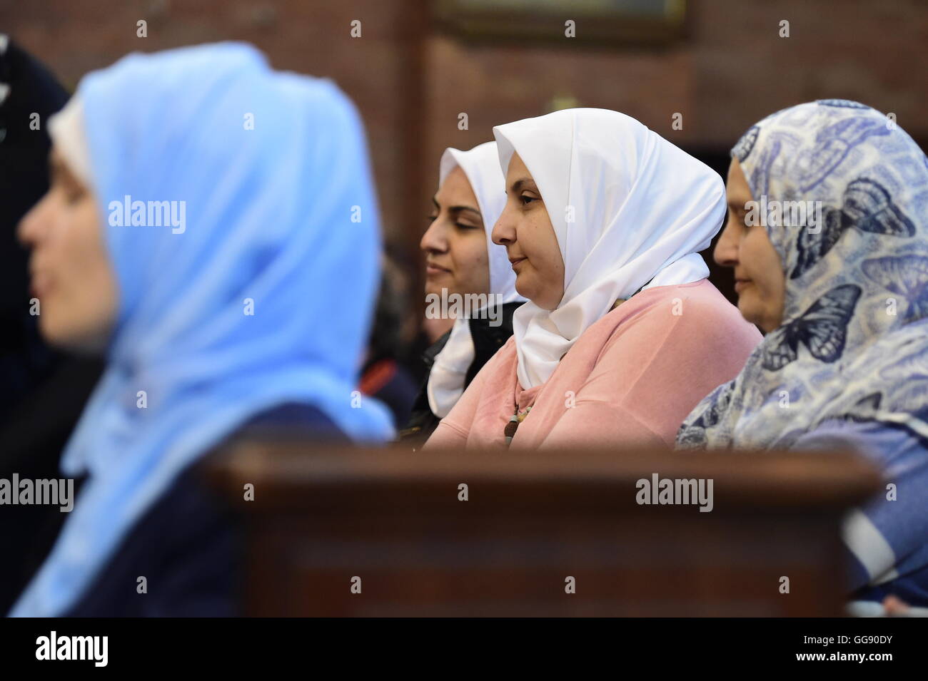 Demonstration Muslims Against Terrorism. Muslims attend Mass in Church ...
