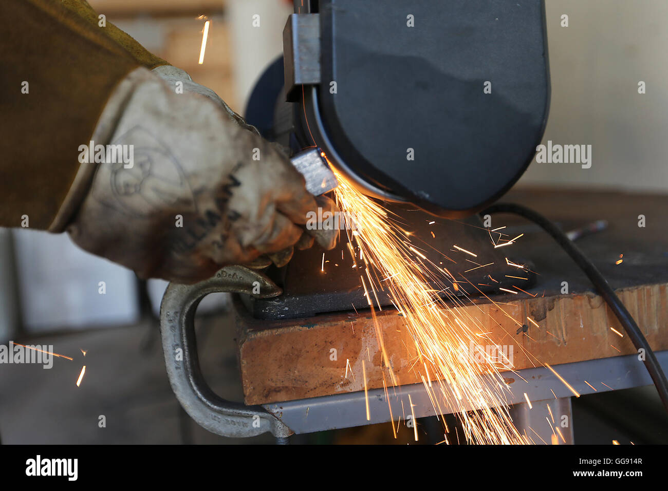 Napa, CA, USA. 7th July, 2016. Sparks fly as blacksmith Julie Henry ...