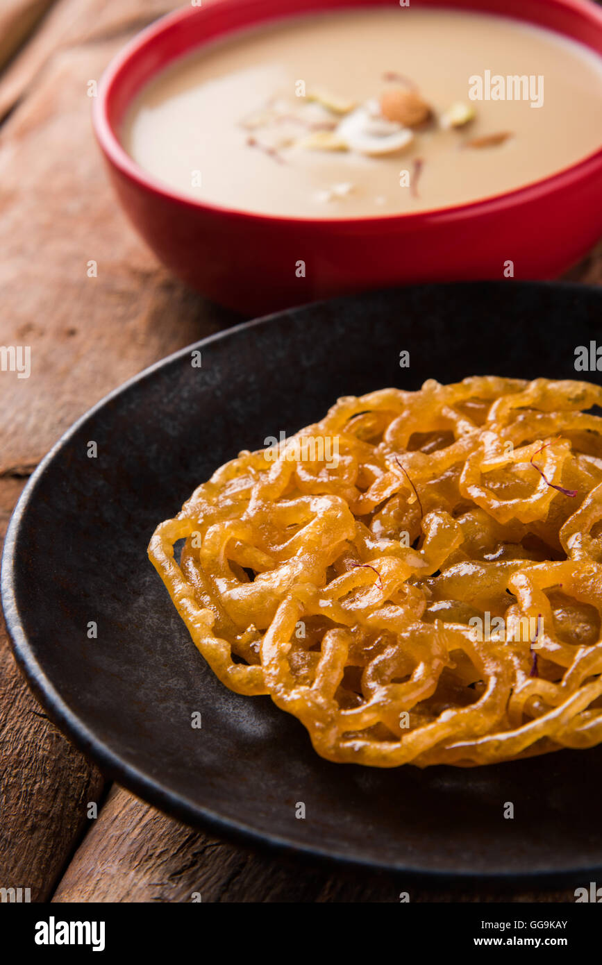 jalebi or imarati with rabdi made from condensing milk, famous dessert ...
