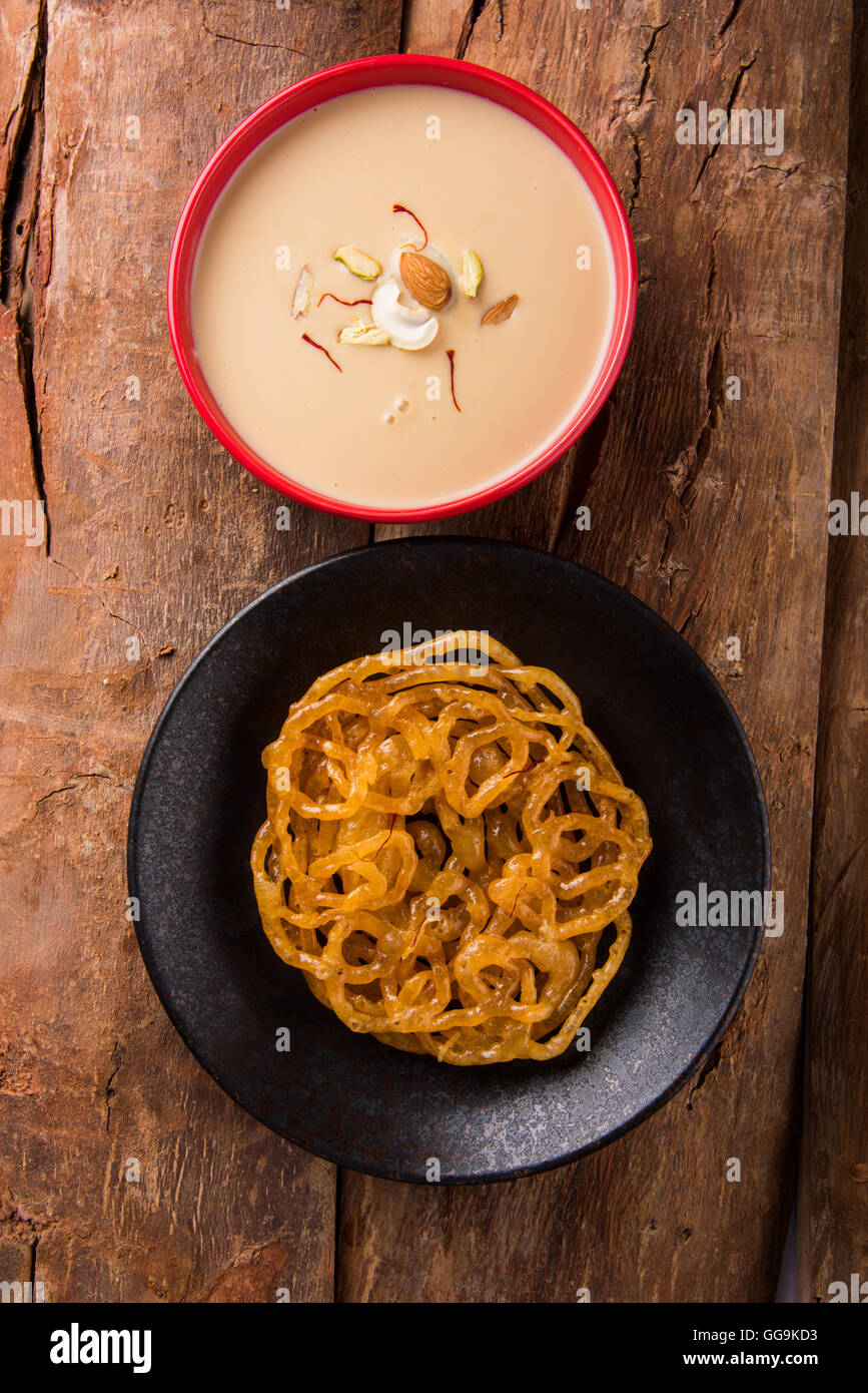 jalebi or imarati with rabdi made from condensing milk, famous dessert ...