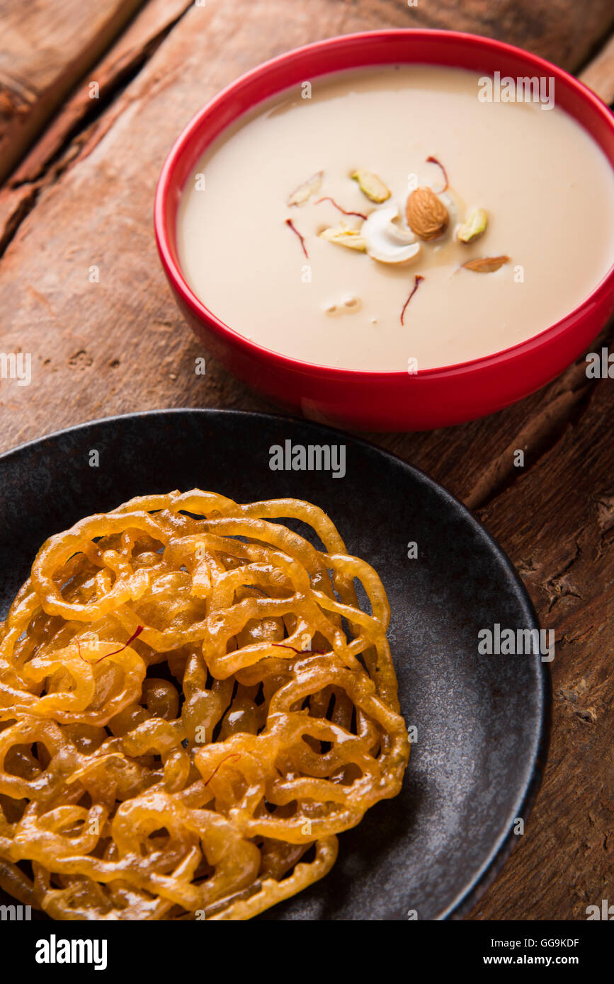 jalebi or imarati with rabdi made from condensing milk, famous dessert ...