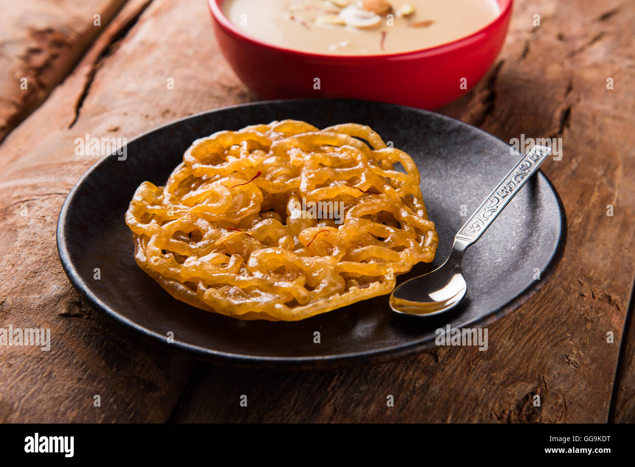 jalebi or imarati with rabdi made from condensing milk, famous dessert ...