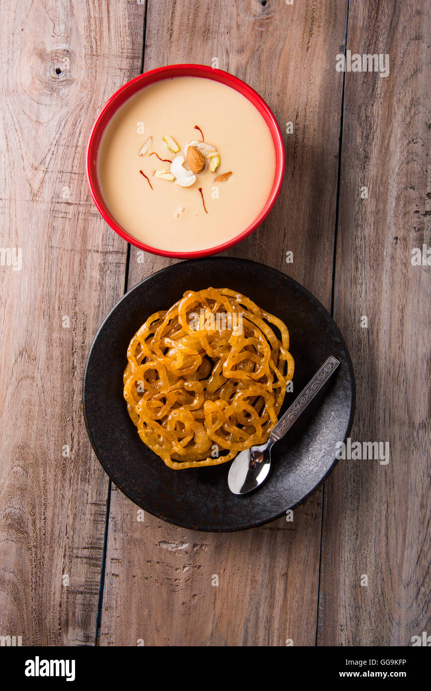 jalebi or imarati with rabdi made from condensing milk, famous dessert ...