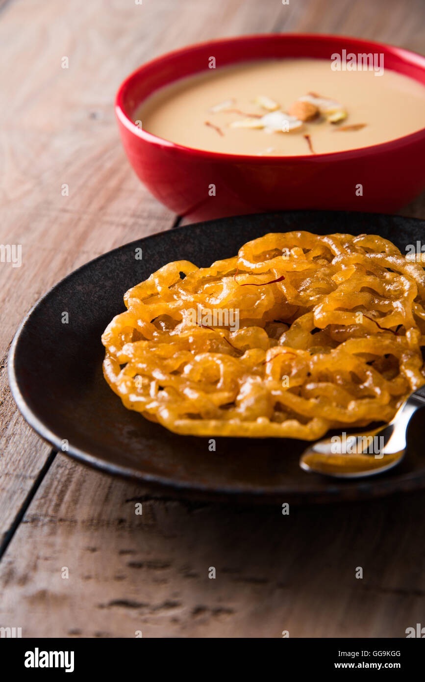 jalebi or imarati with rabdi made from condensing milk, famous dessert ...