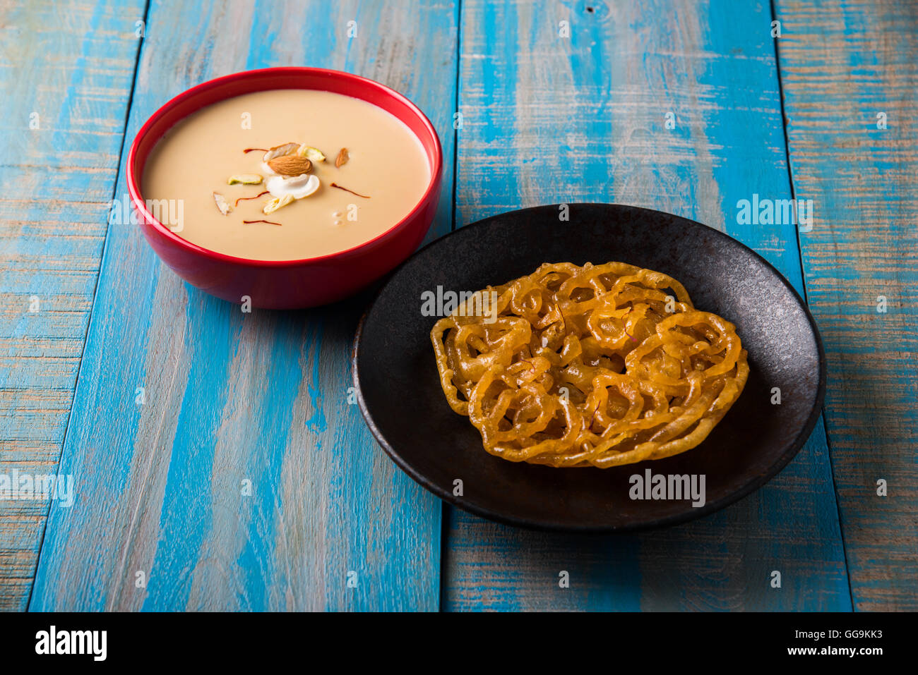 jalebi or imarati with rabdi made from condensing milk, famous dessert ...