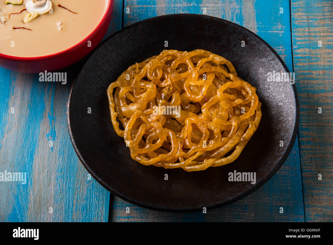 jalebi or imarati with rabdi made from condensing milk, famous dessert ...