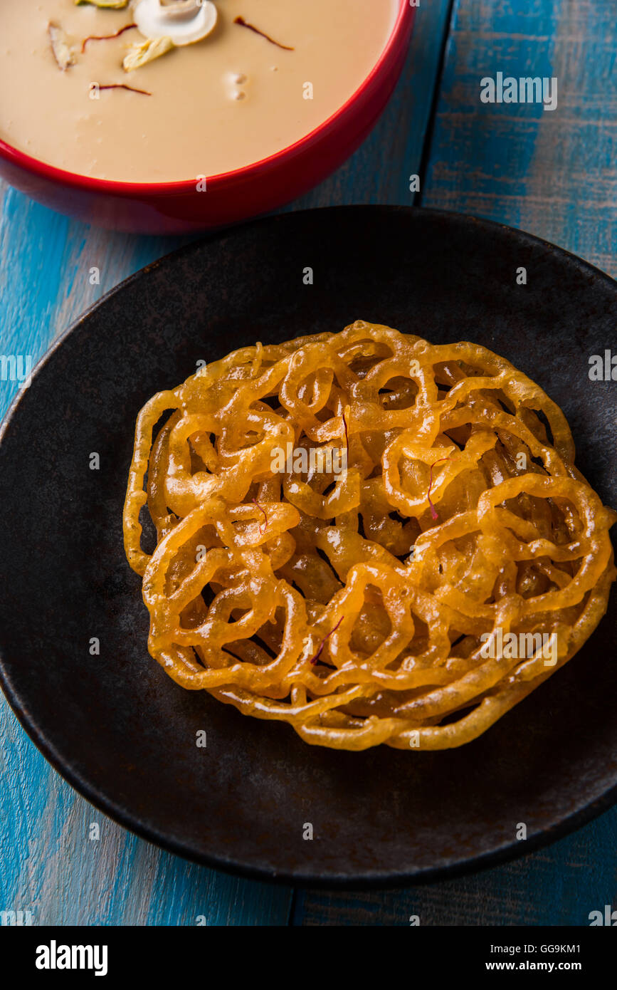 jalebi or imarati with rabdi made from condensing milk, famous dessert ...
