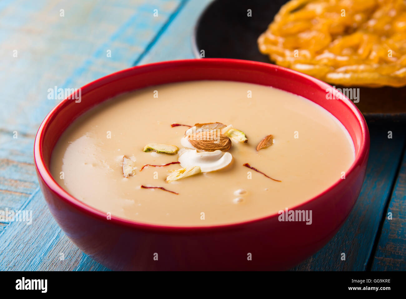 jalebi or imarati with rabdi made from condensing milk, famous dessert ...