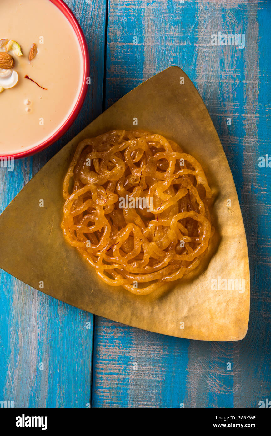 jalebi or imarati with rabdi made from condensing milk, famous dessert ...