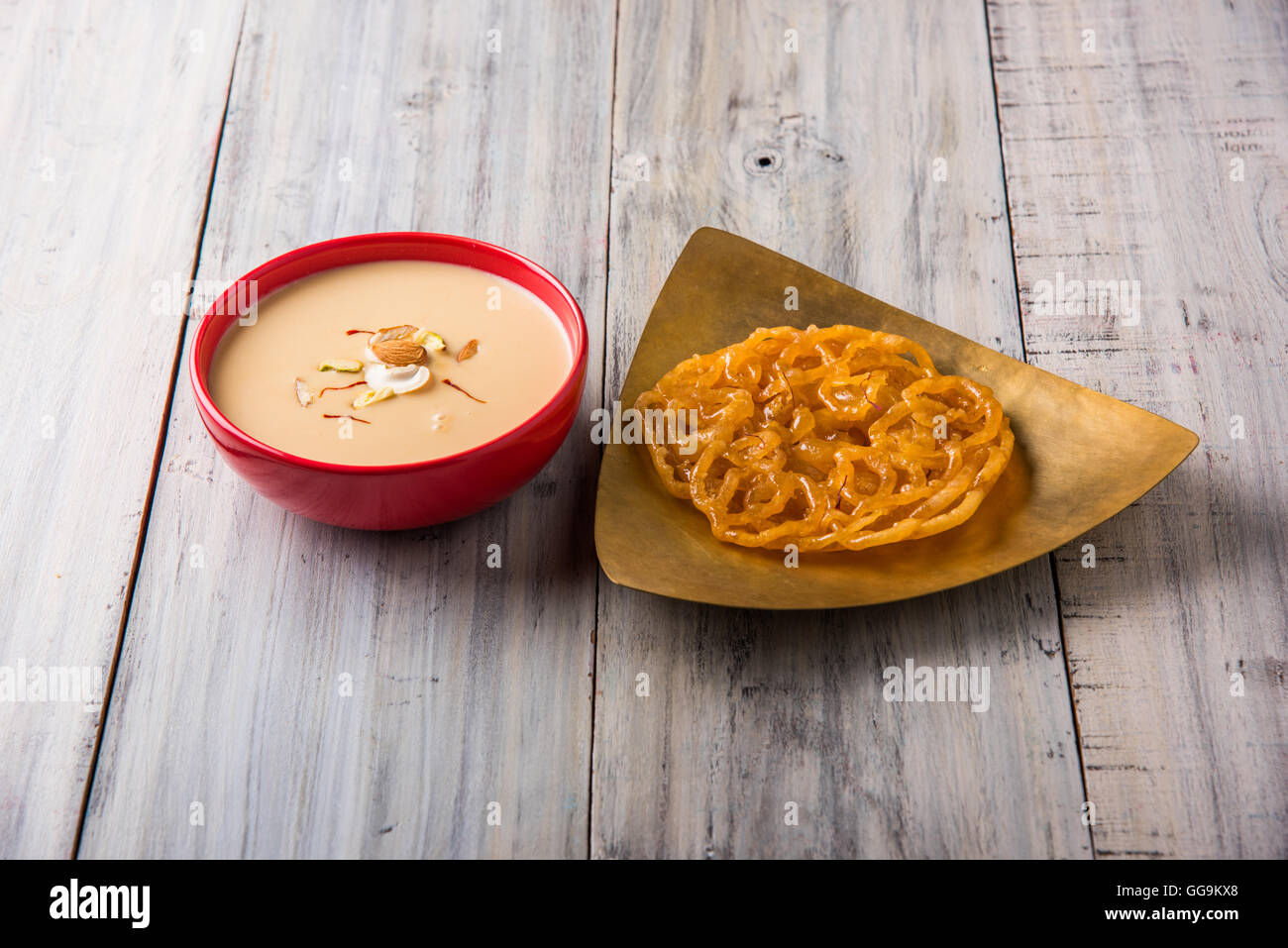 jalebi or imarati with rabdi made from condensing milk, famous dessert ...