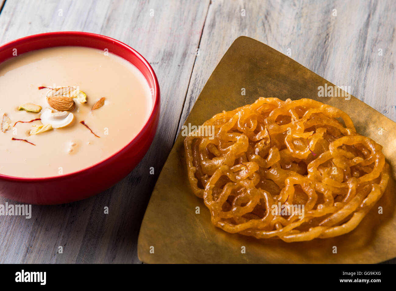 jalebi or imarati with rabdi made from condensing milk, famous dessert ...