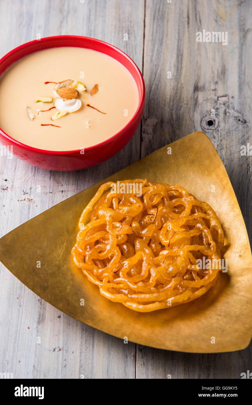 jalebi or imarati with rabdi made from condensing milk, famous dessert ...