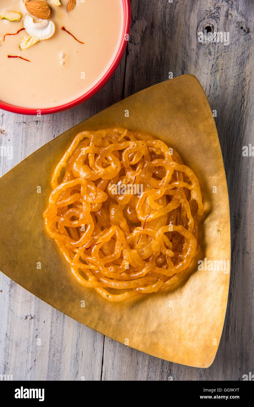 jalebi or imarati with rabdi made from condensing milk, famous dessert ...
