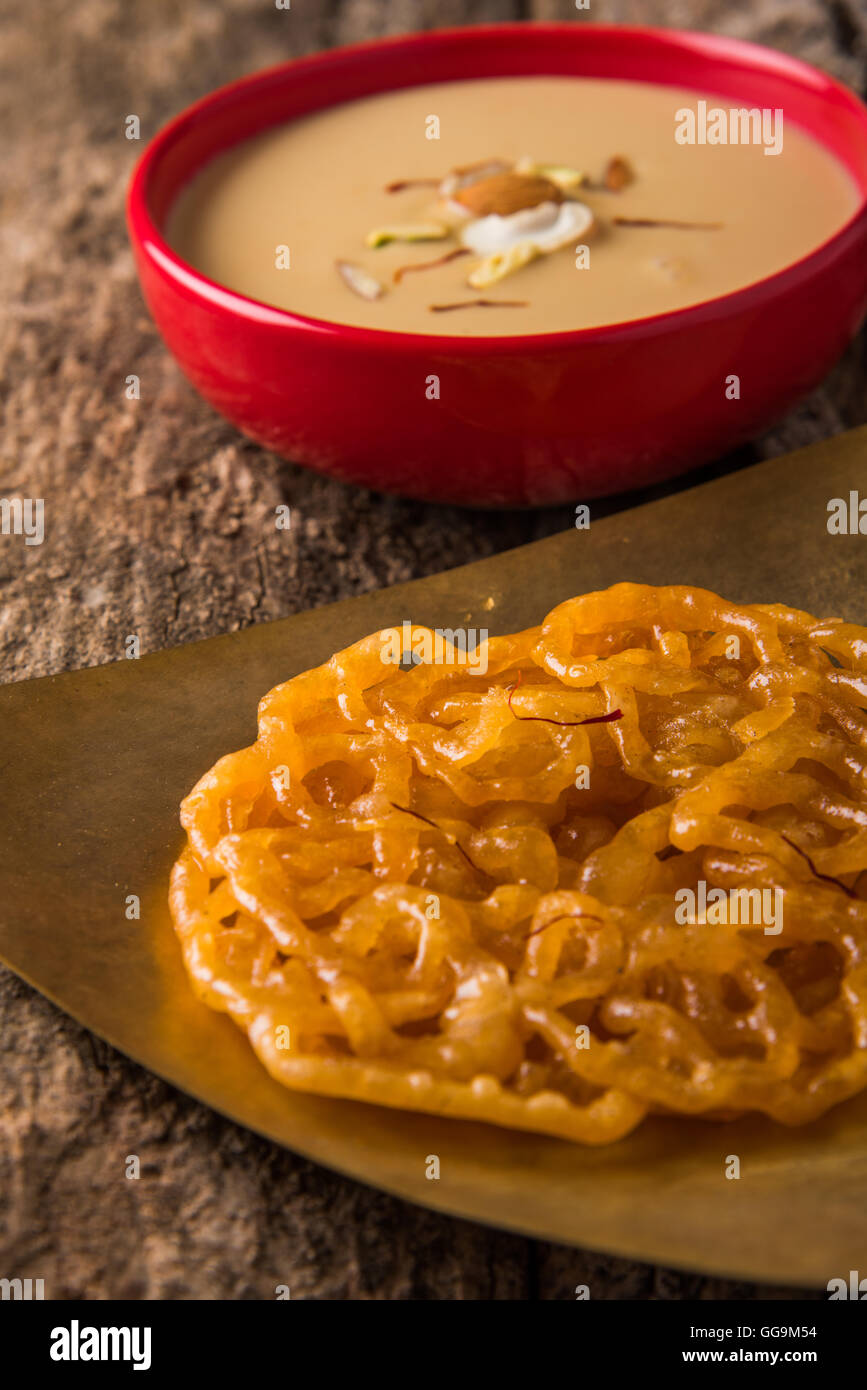 jalebi or imarati with rabdi made from condensing milk, famous dessert ...