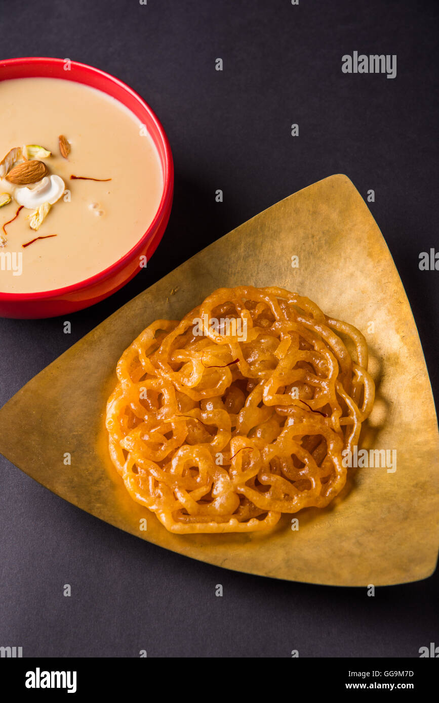 jalebi or imarati with rabdi made from condensing milk, famous dessert ...